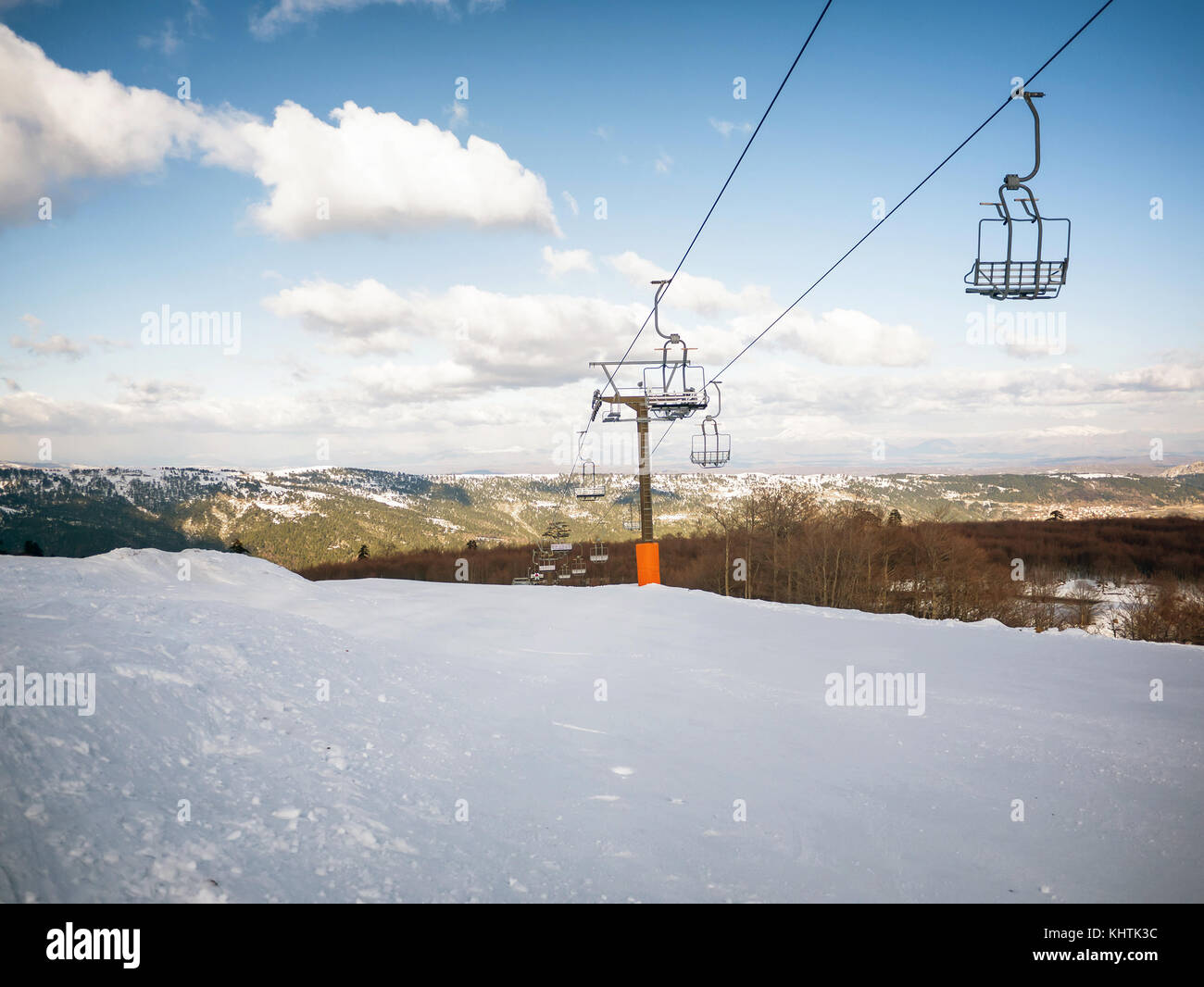 ski lift on the slope of a big ski resort Stock Photo - Alamy