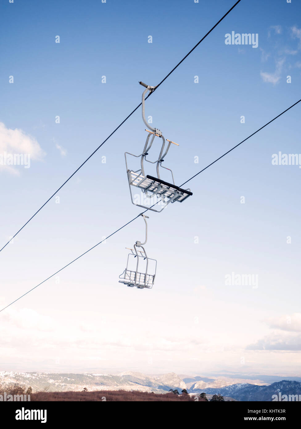 ski lift on the slope of a big ski resort Stock Photo - Alamy