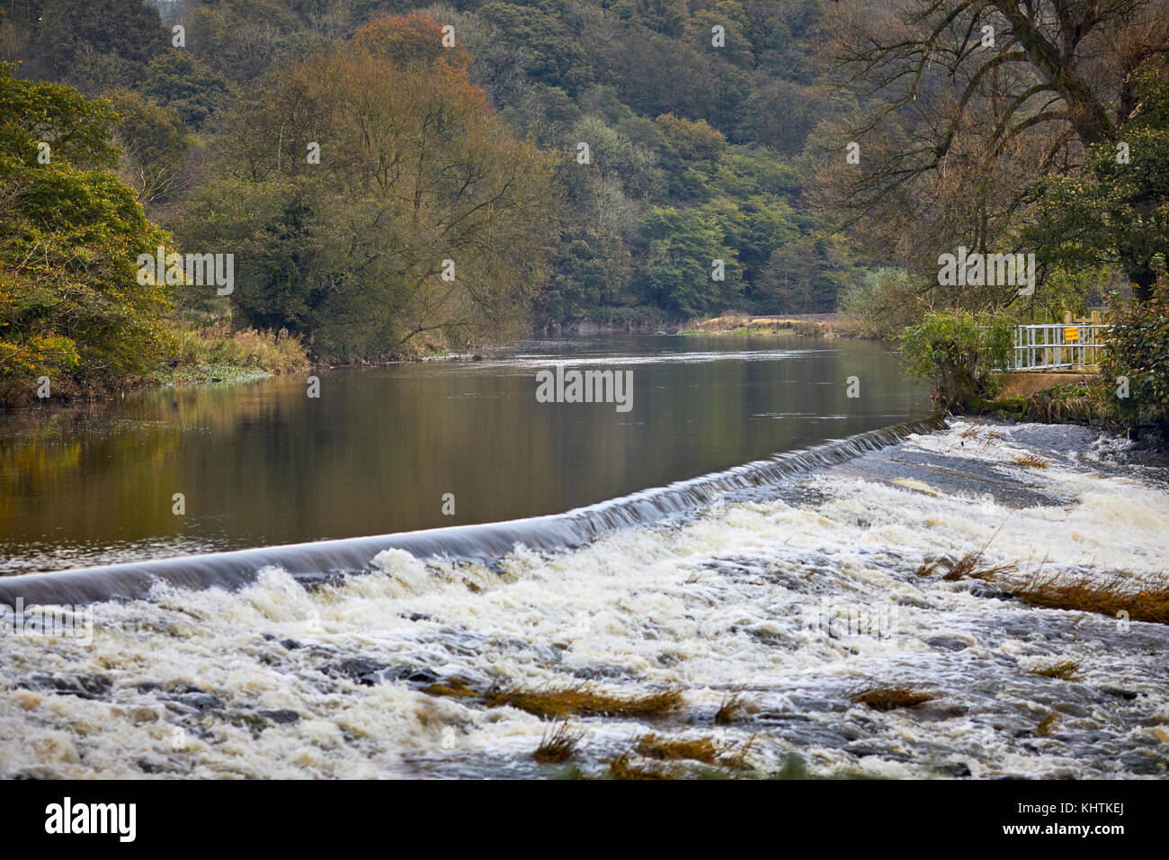 Autumn in Ribble Valley village Whalley in Lancashire, a small weir on ...