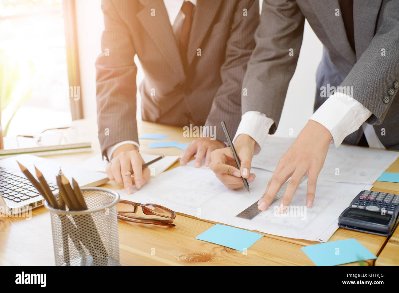 Two business Engineer discussing meeting architectural project working ...