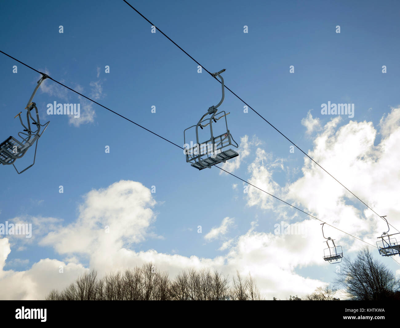 ski lift on the slope of a big ski resort Stock Photo - Alamy