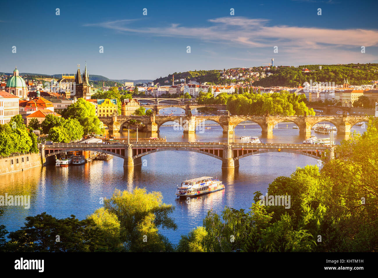 View of the Vltava River and the bridges shined with the sunset sun ...