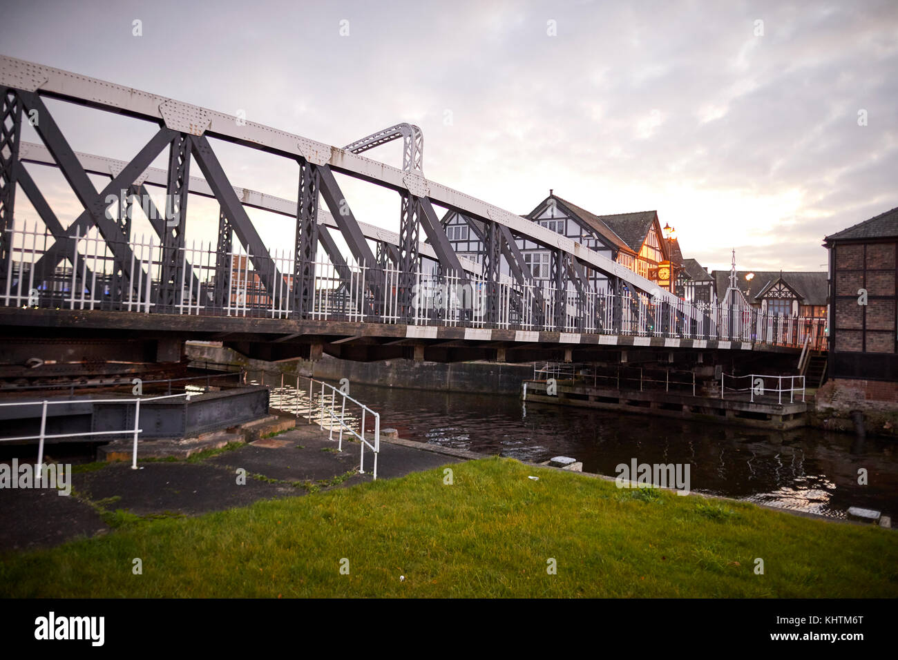 The Northwhich Town Swing Bridge over the River Weaver, with the Tudor ...