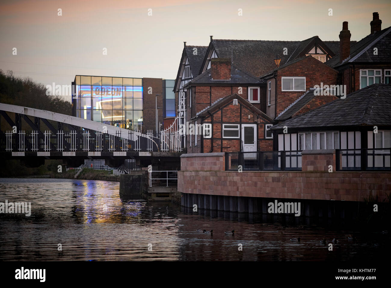 The Northwhich Town Swing Bridge over the River Weaver, with the Tudor ...