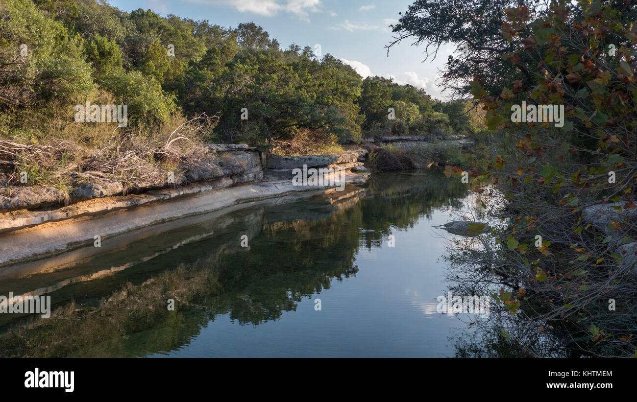 View of River Next To Cliff on a Sunny Day Stock Photo - Alamy