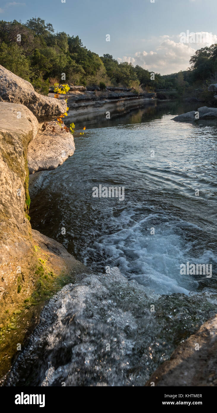 Portrait View of Waterfall With River in the Background Stock Photo - Alamy
