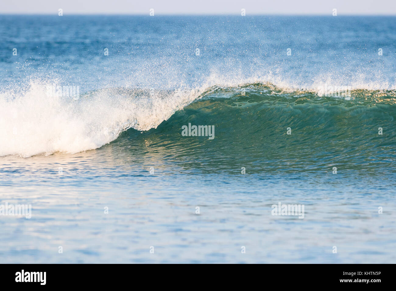 Ma at beach with wave hi-res stock photography and images - Alamy