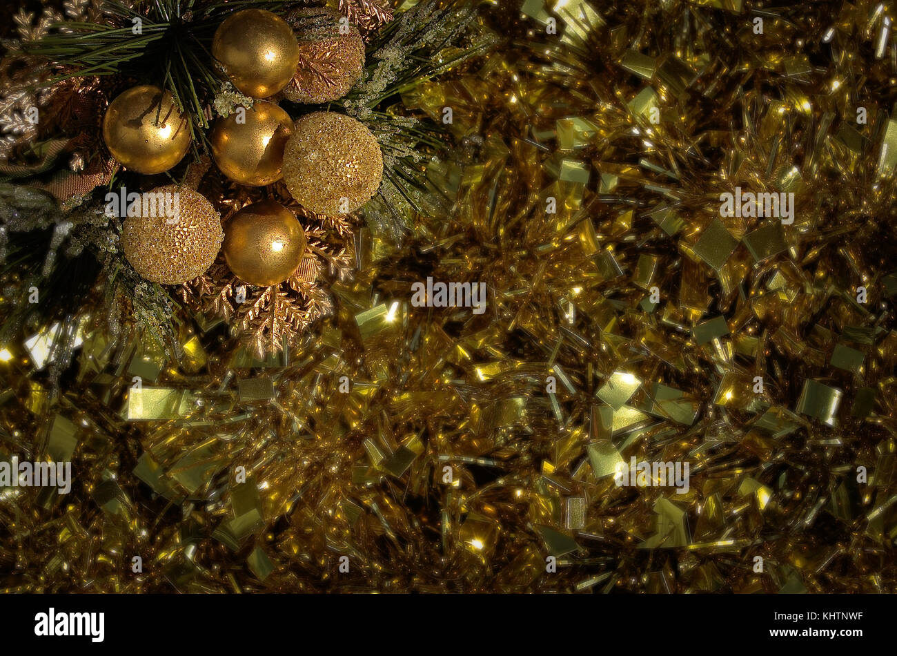 Christmas decorations with golden tinsel Stock Photo - Alamy