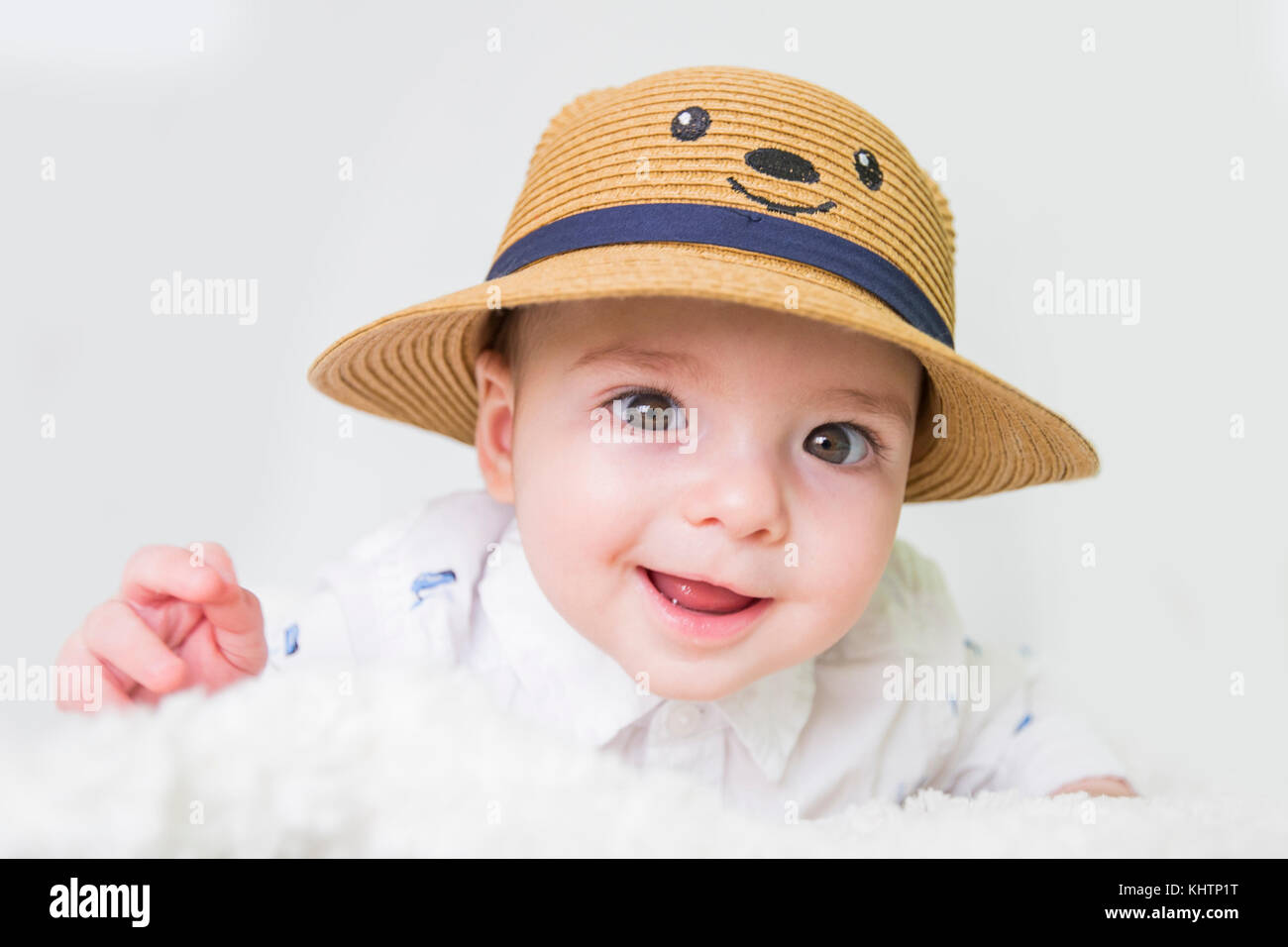 baby boy with straw hat Stock Photo - Alamy