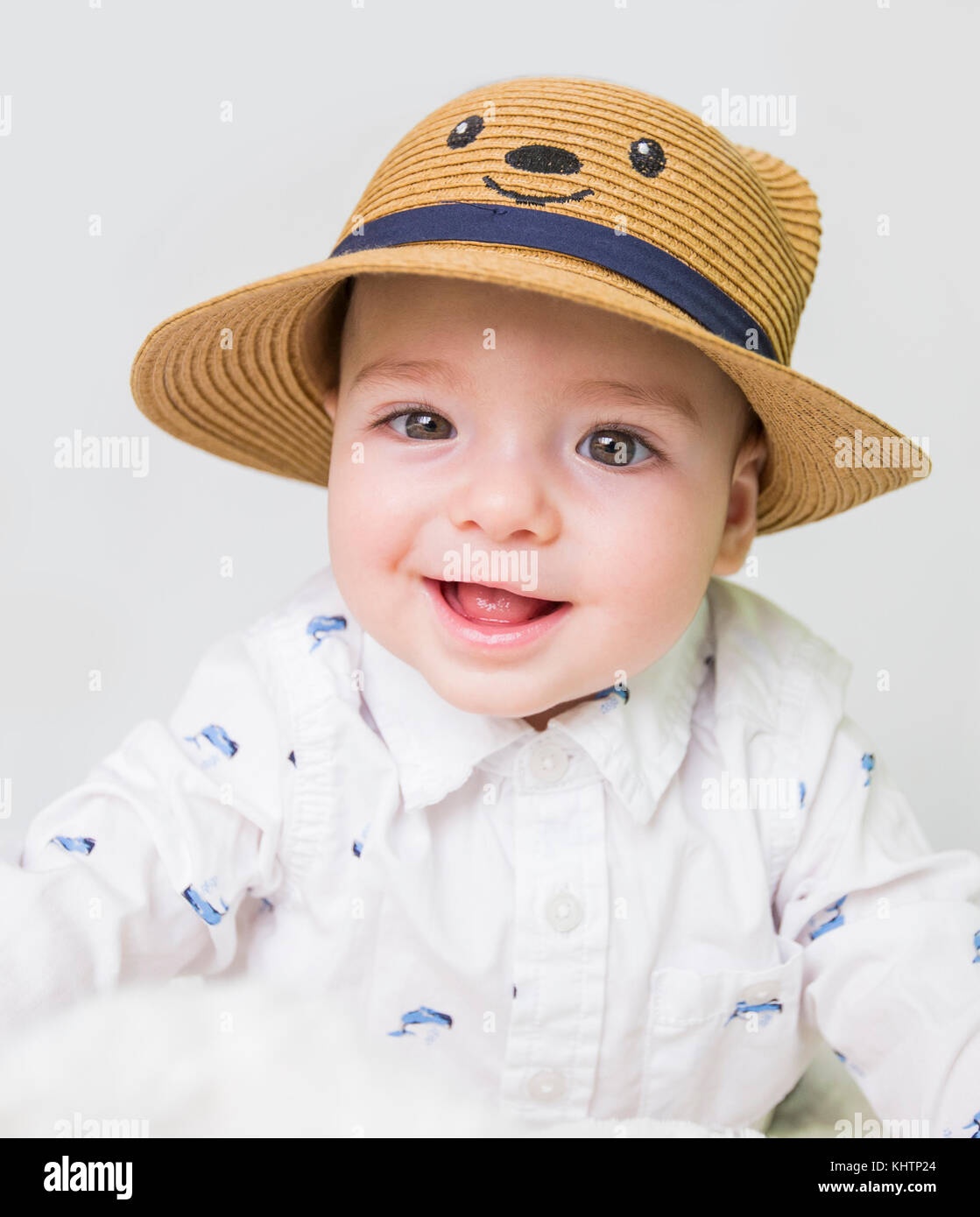 baby boy with straw hat Stock Photo - Alamy