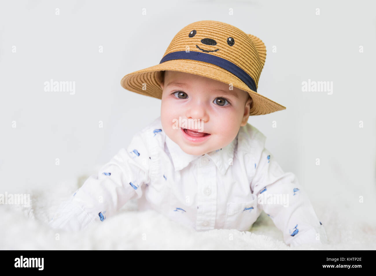 baby boy with straw hat Stock Photo - Alamy