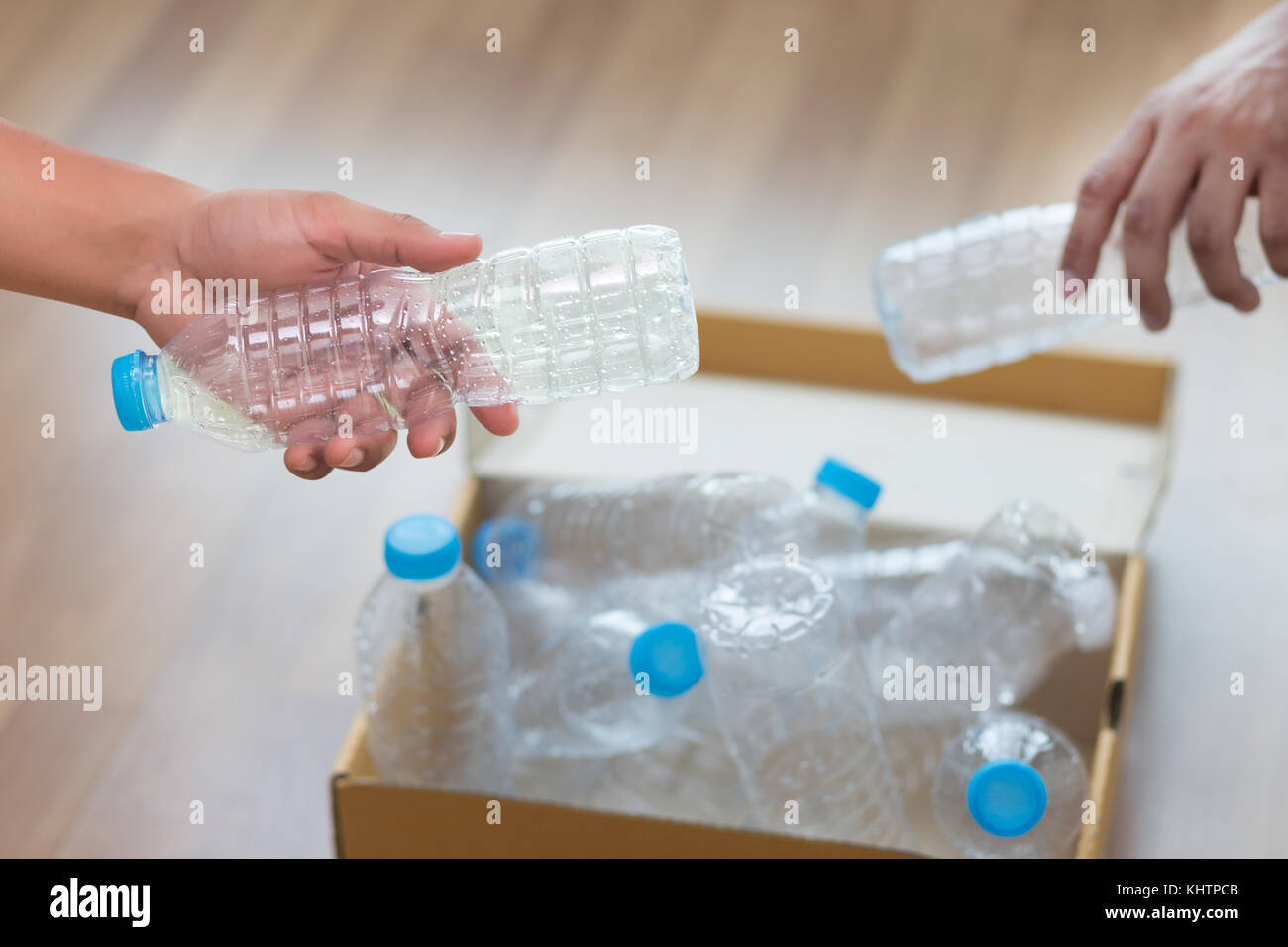 man hand putting plastic reuse for recycling concept environmental ...