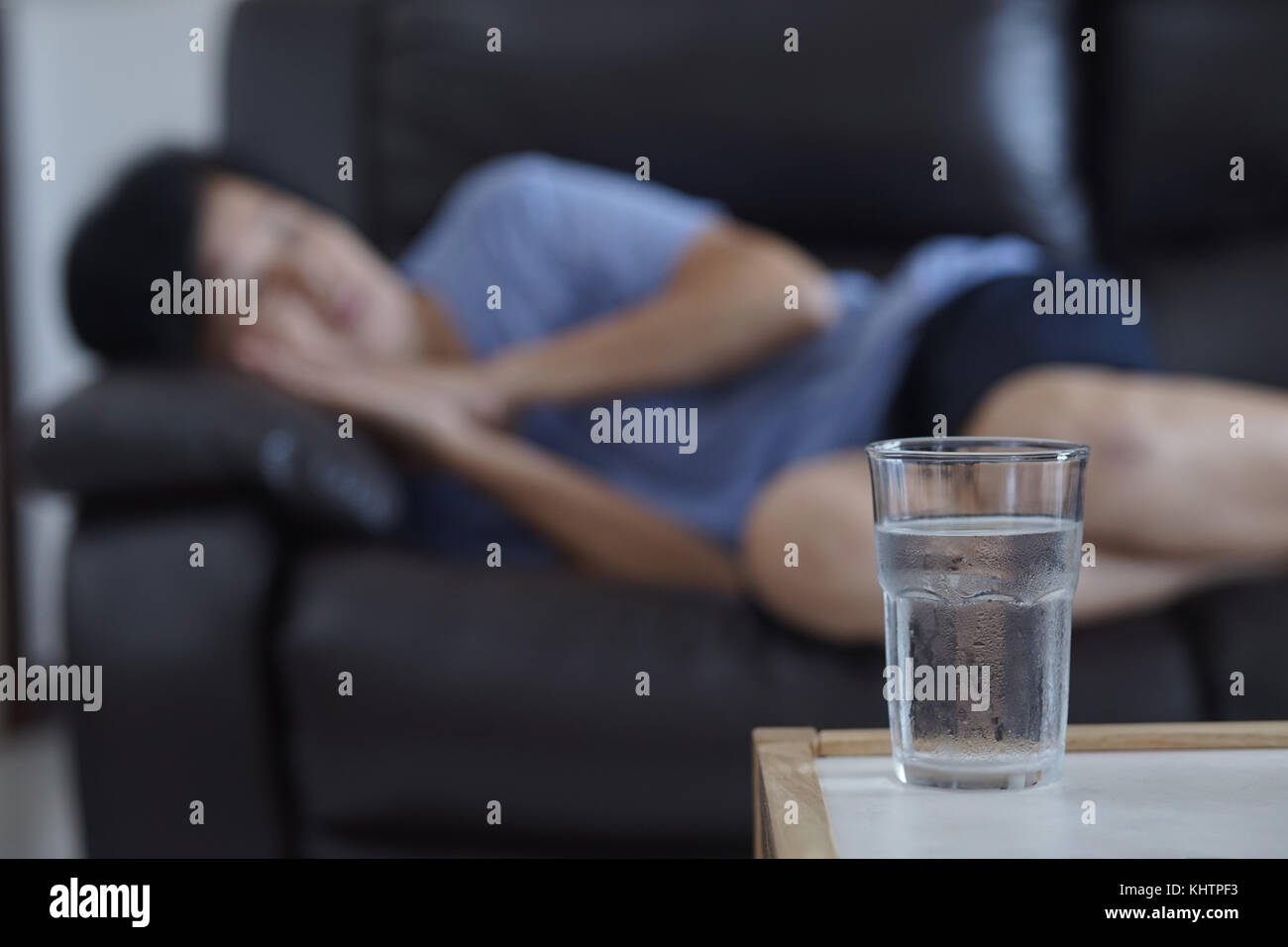 elderly woman sleeping at home Glass water on table sleep retirement ...
