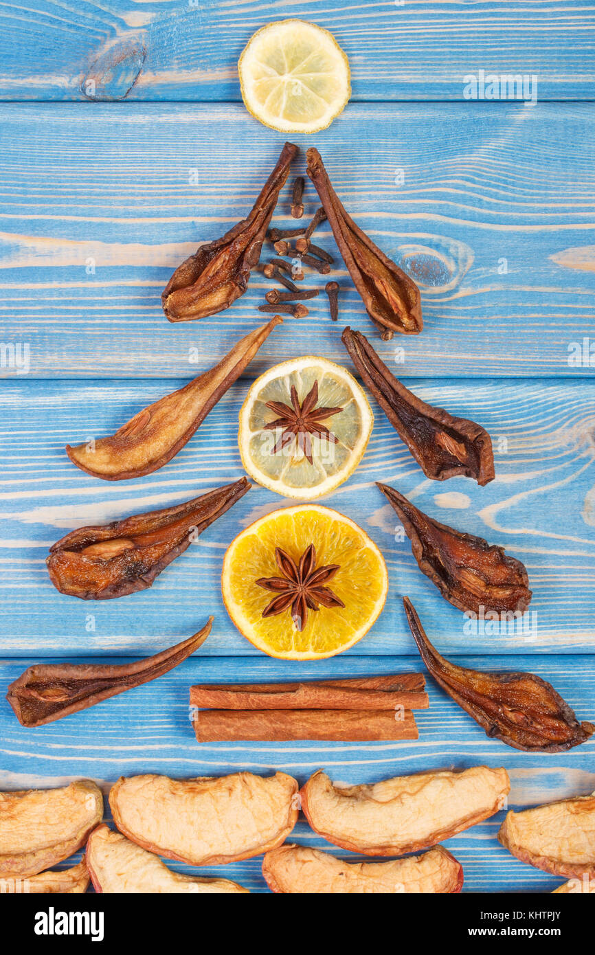 Christmas tree shape made of dried fruits and spices for preparing ...