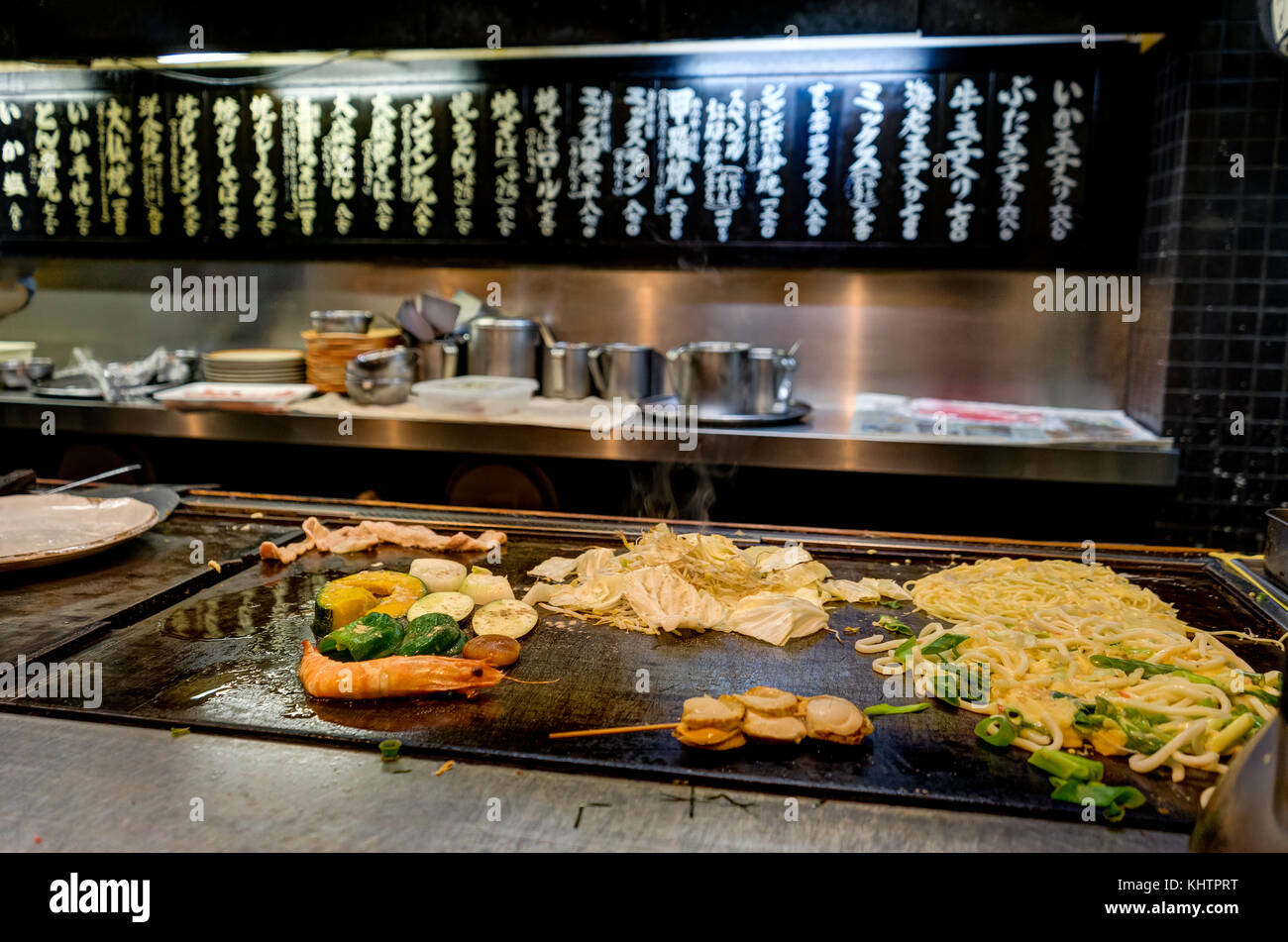 Kyoto Japan - October 2017 - Chef making Okonomiyaki in Kyoto Japan ...