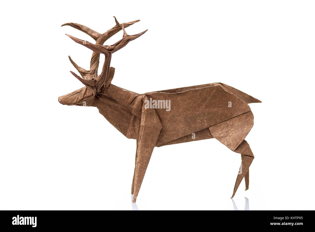 Origami reindeer design on white Stock Photo - Alamy
