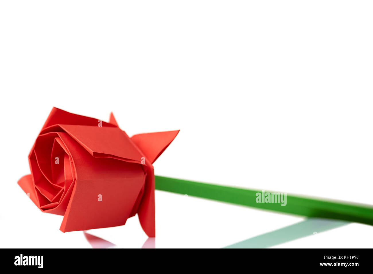 Red rose origami model Stock Photo - Alamy