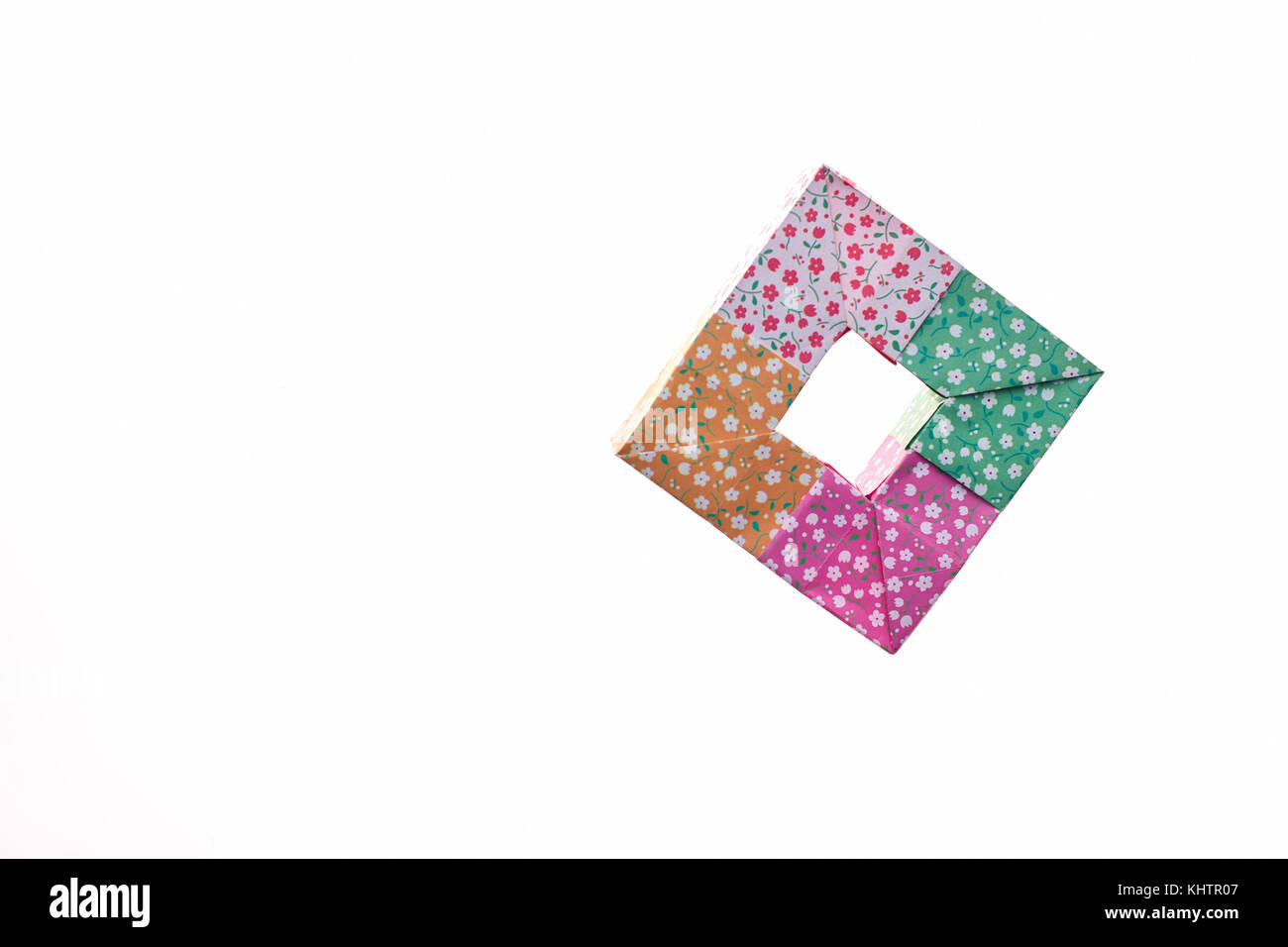 Multicolor cubic origami model Stock Photo - Alamy