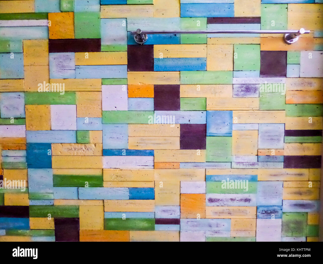 Wood pieces random fancy color on background Stock Photo - Alamy