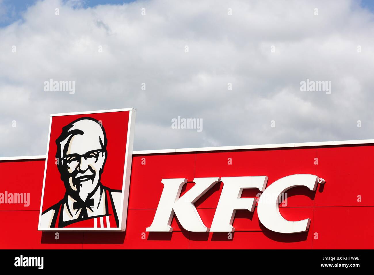 Holdorf, Germany - July 2, 2017: KFC logo on wall. KFC is a fast food ...