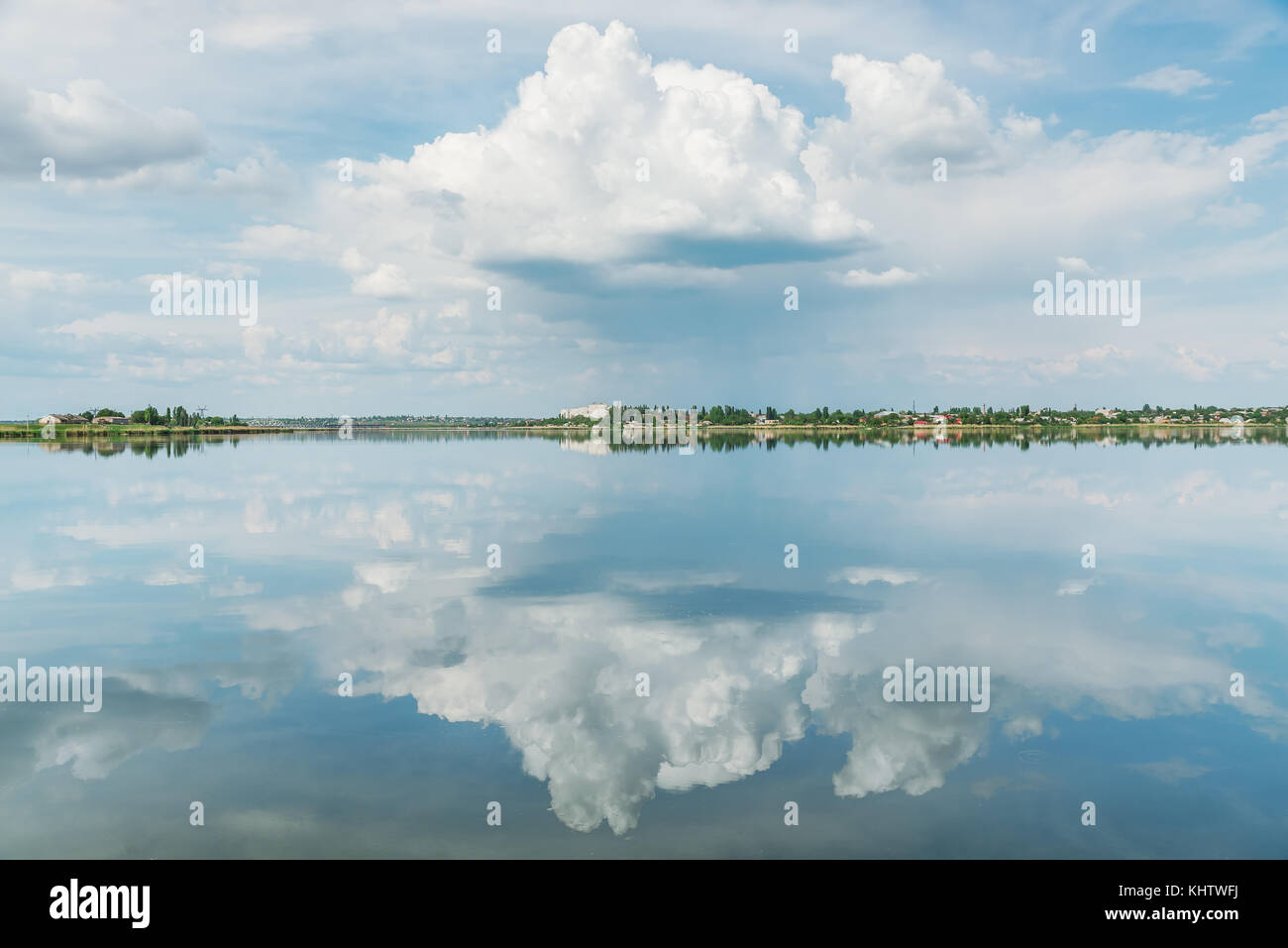 dramatic clouds in sky and river reflection Stock Photo - Alamy