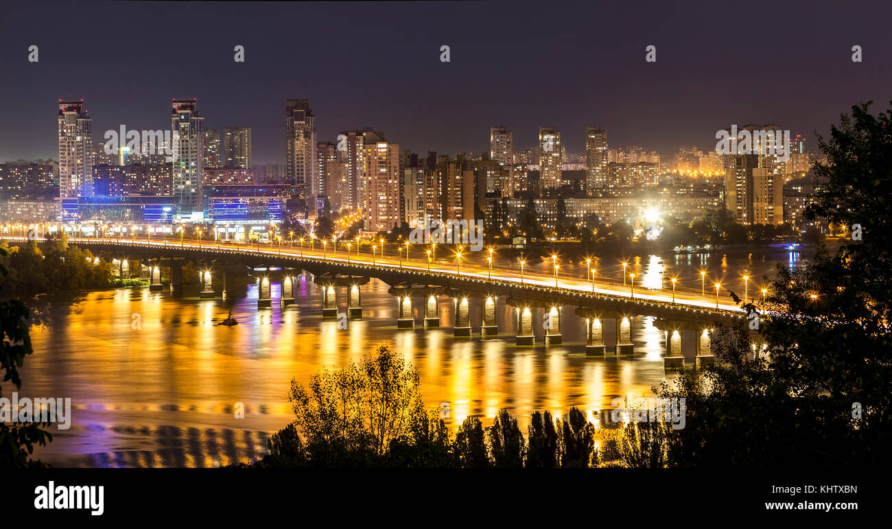 Kyiv (Kiev) city, the capital of Ukraine at night beside the Dnipro ...