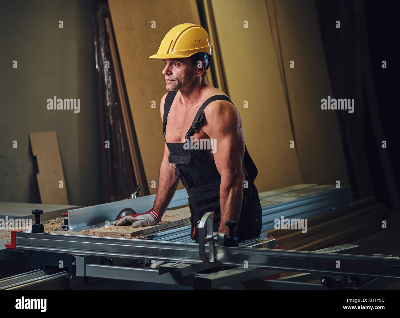 Portrait of shirtless muscular carpenter Stock Photo - Alamy