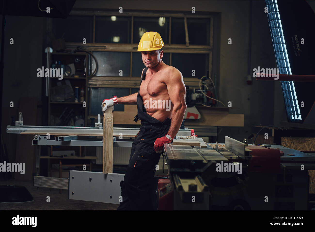 Portrait of shirtless muscular carpenter Stock Photo - Alamy