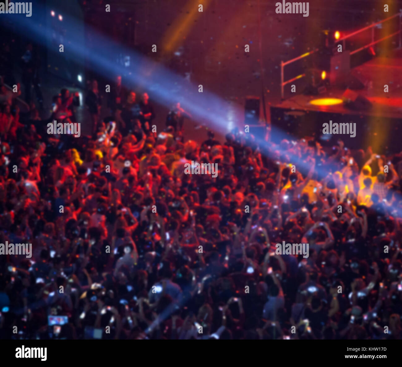 crowd having fun at concert - blurred image Stock Photo - Alamy