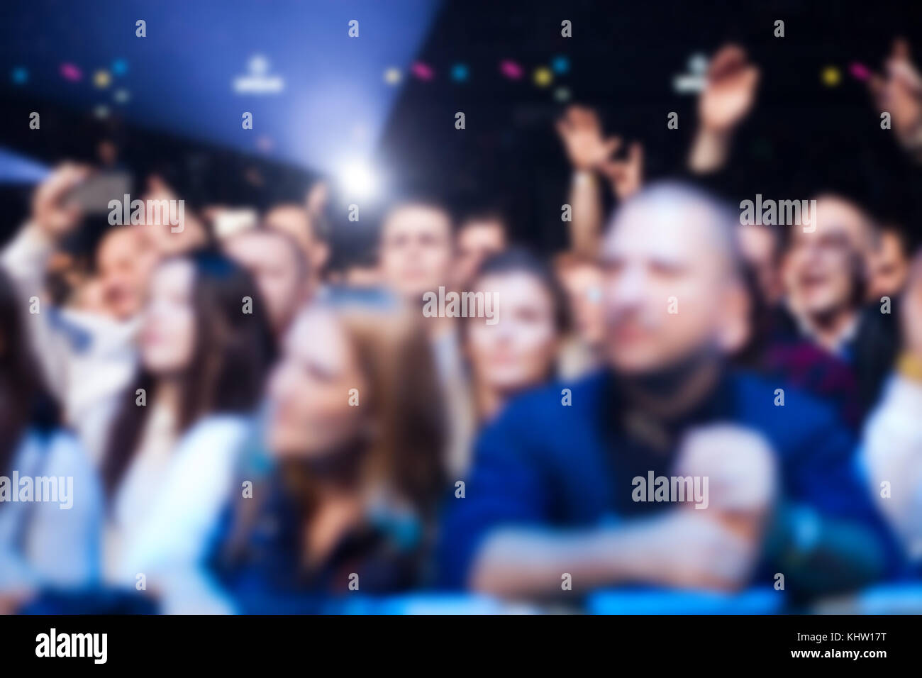 crowd having fun at concert - blurred image Stock Photo - Alamy