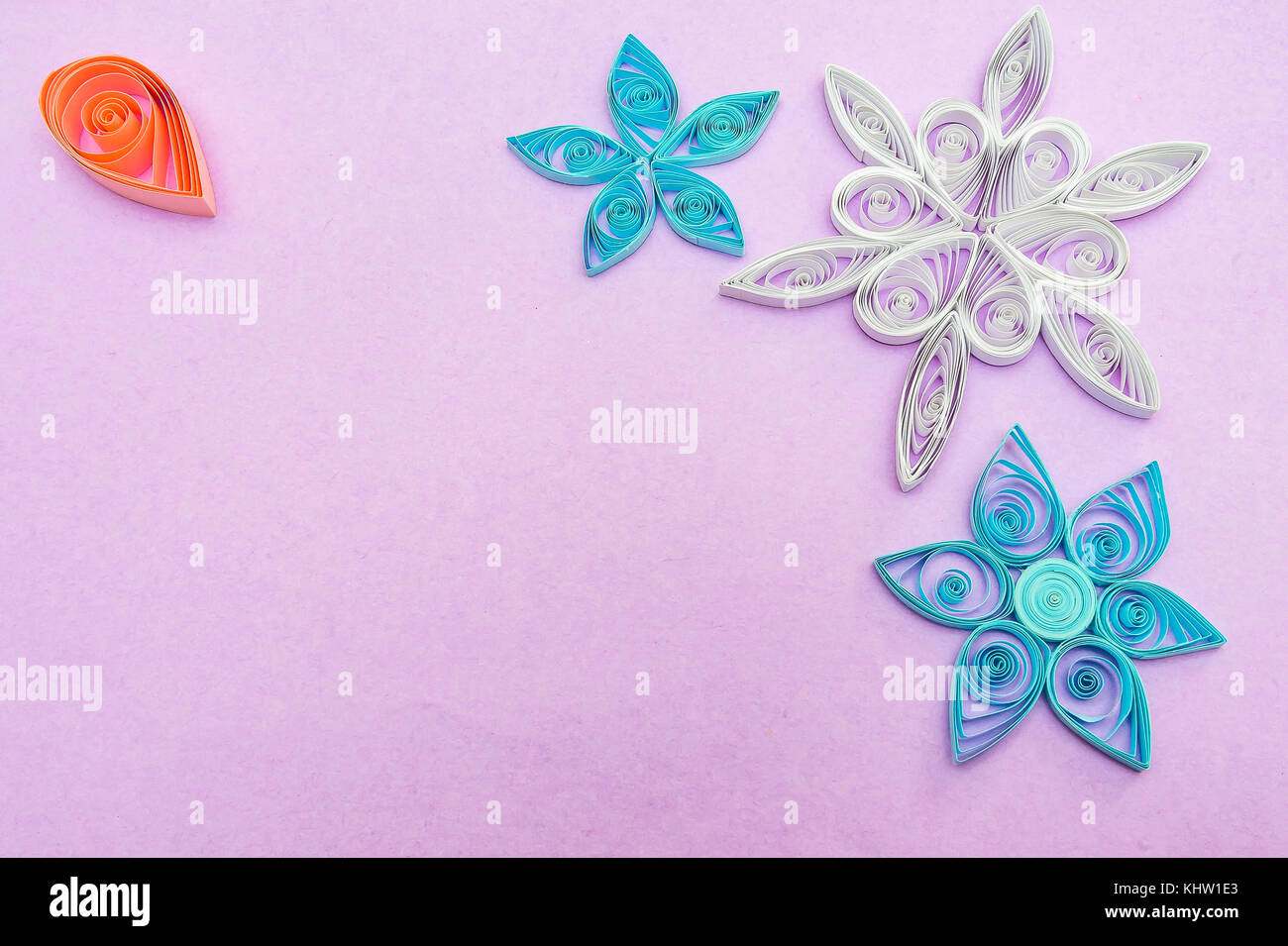 flowers made quilling on a light background quilling Stock Photo - Alamy