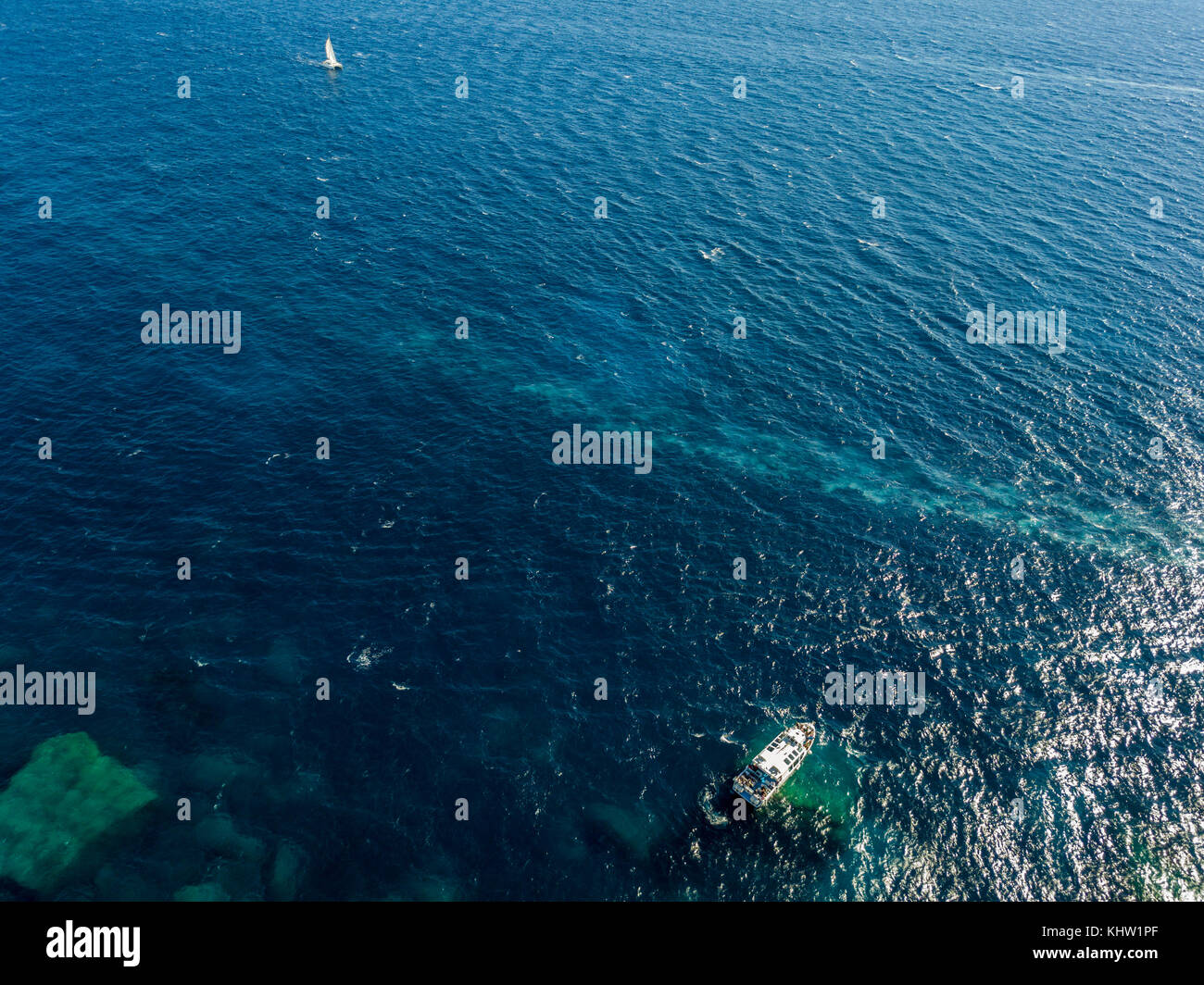 Aerial view sailboat floating green sea water hi-res stock photography ...