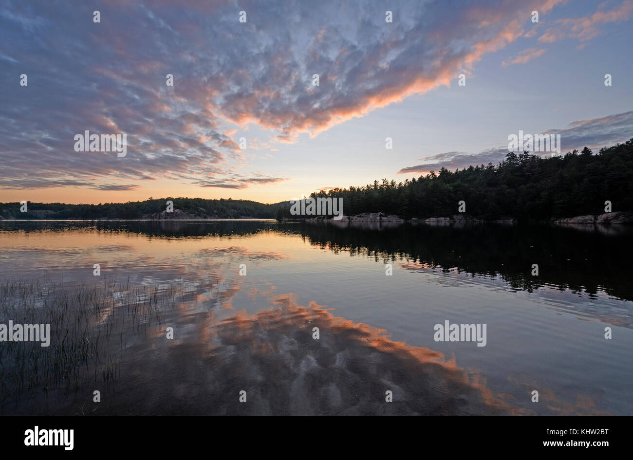 Red dusk reflections on lake hi-res stock photography and images - Alamy