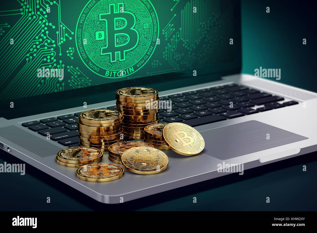 Computer with Bitcoin symbol on-screen and piles of golden Bitcoin ...