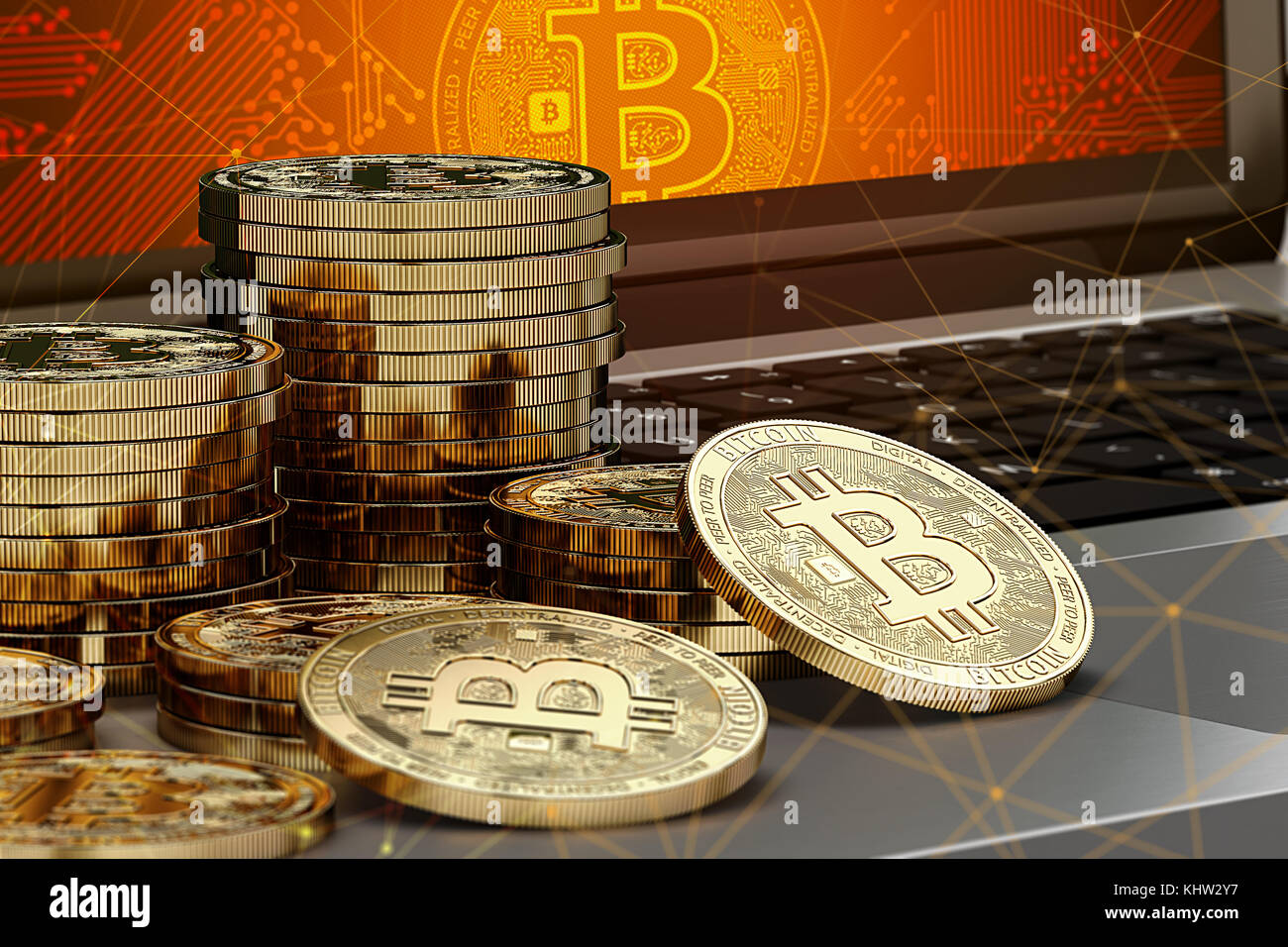 Close-up shot on Bitcoin piles laying on computer with Bitcoin logo on ...