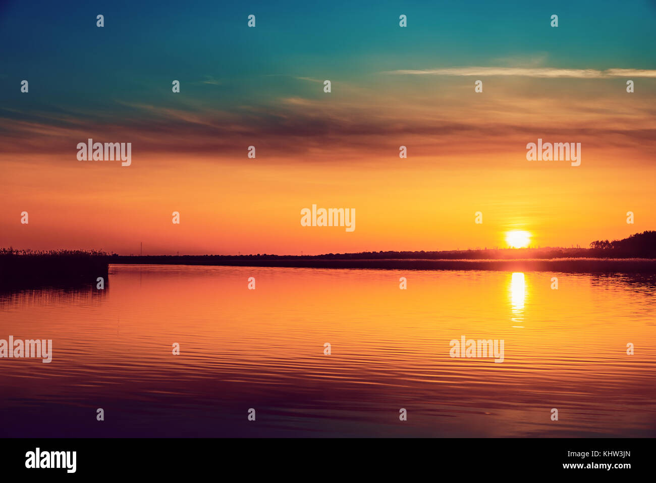 good orange sunset over river Stock Photo - Alamy