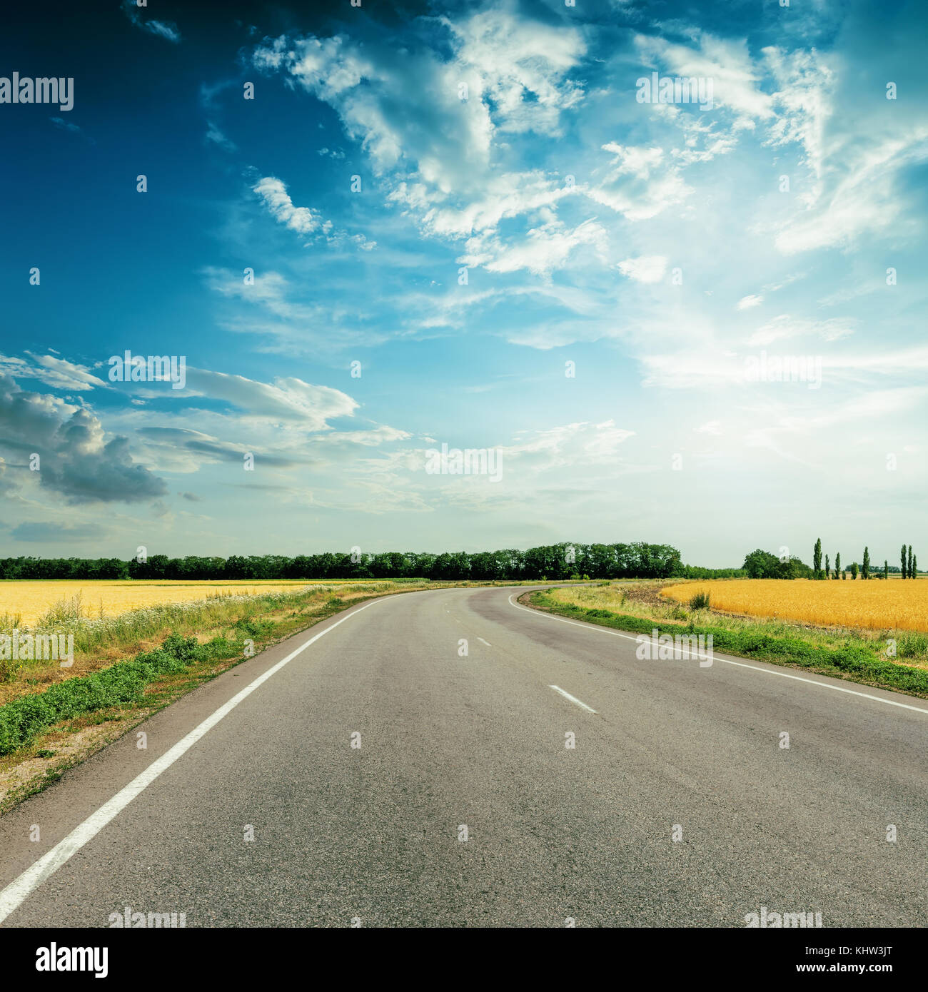 Empty road under sunset sky hi-res stock photography and images - Alamy