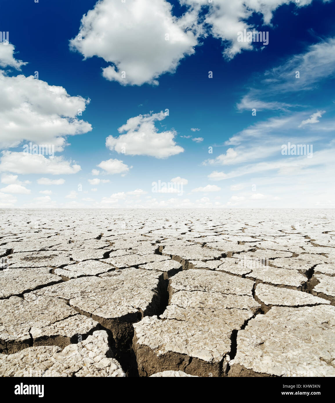 drought land and dramatic sky over it Stock Photo - Alamy