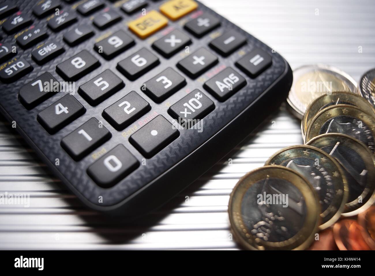 Scientific calculator and cash view Stock Photo - Alamy