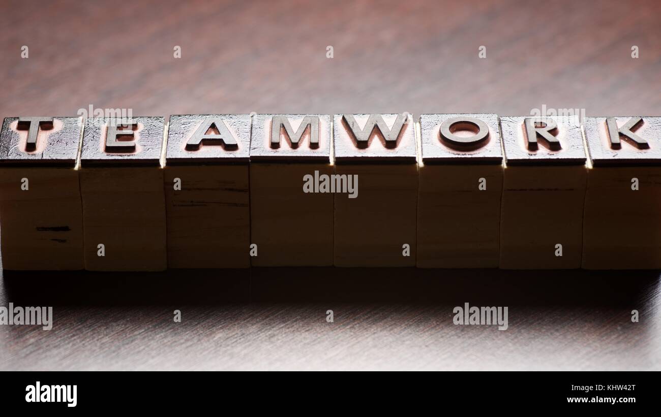 Rubber stamps creating the word teamwork Stock Photo - Alamy