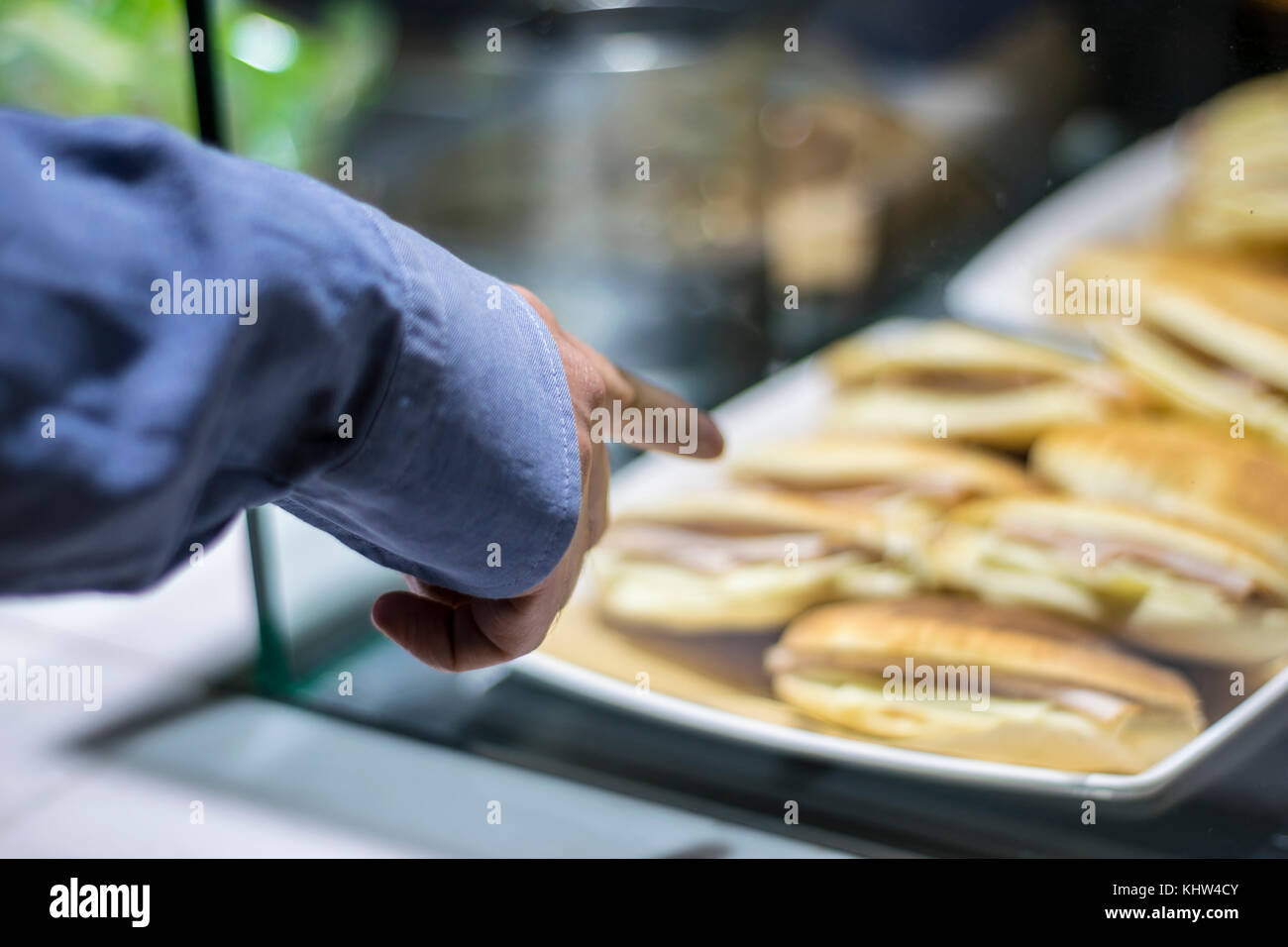 Pointing to food Stock Photo - Alamy