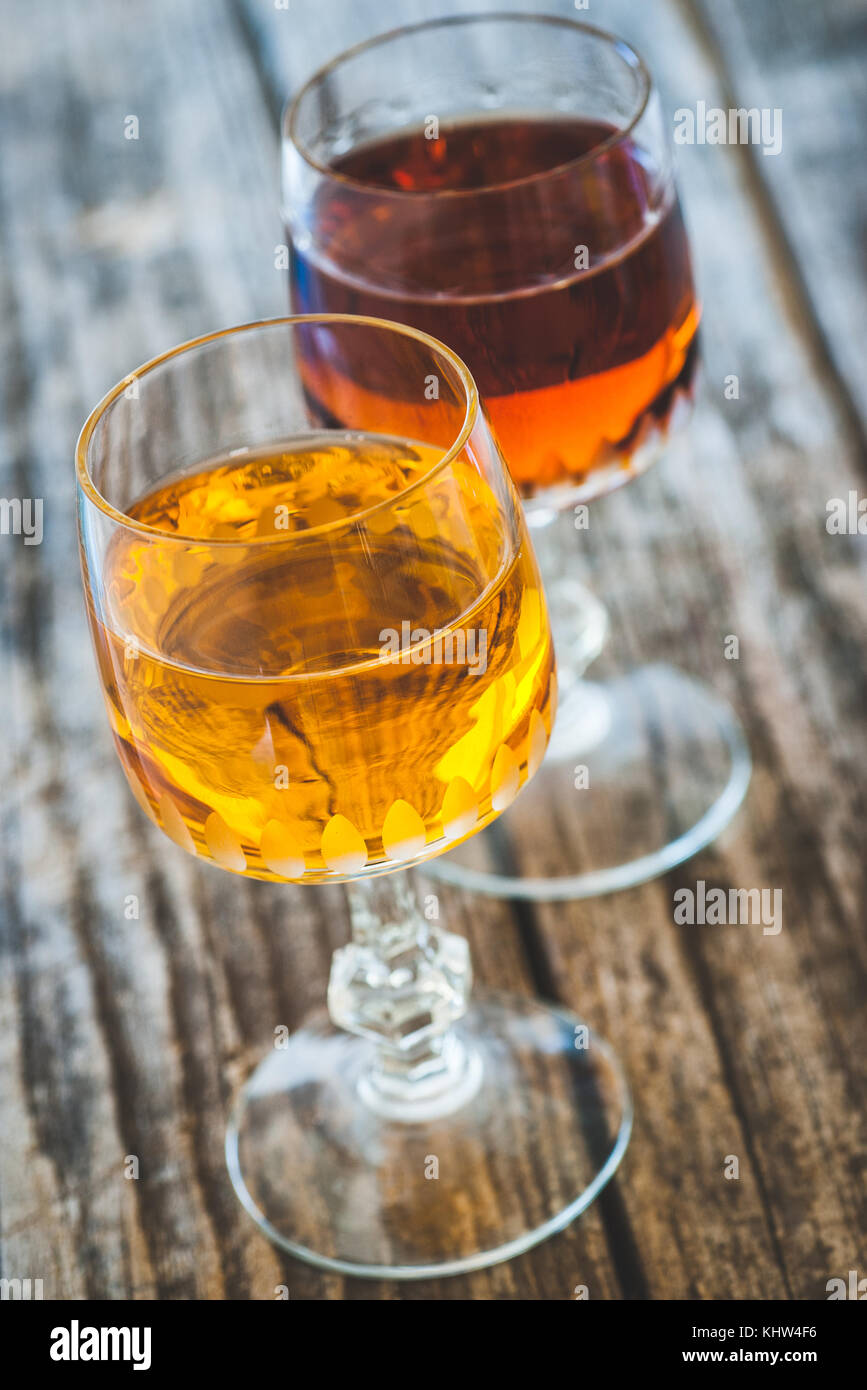liquor in vintage glass - vintage style photo Stock Photo - Alamy