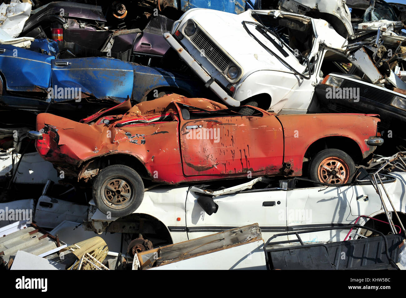 Old damaged cars on the junkyard waiting for recycling Stock Photo - Alamy