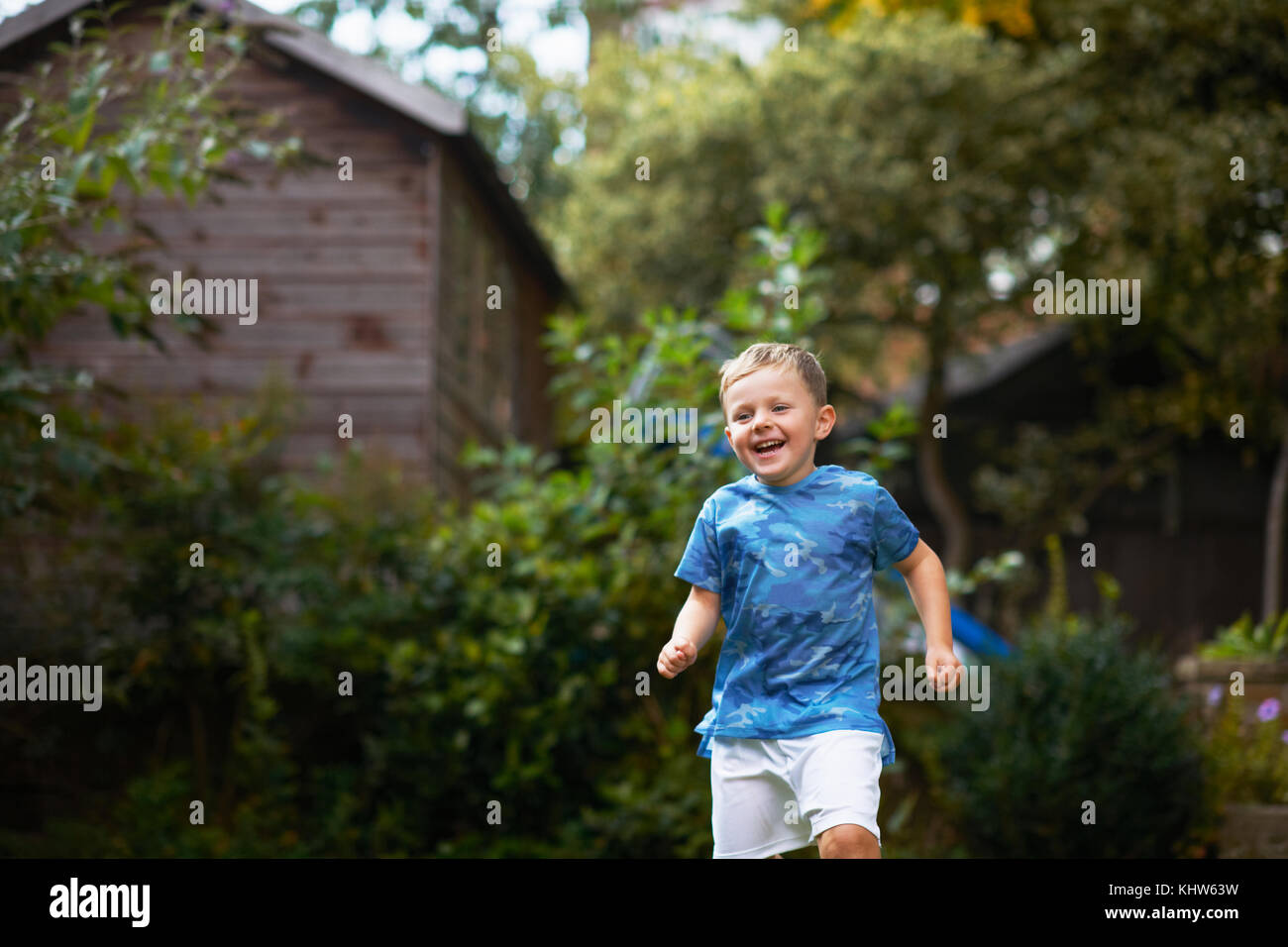 Boy running blur hi-res stock photography and images - Alamy