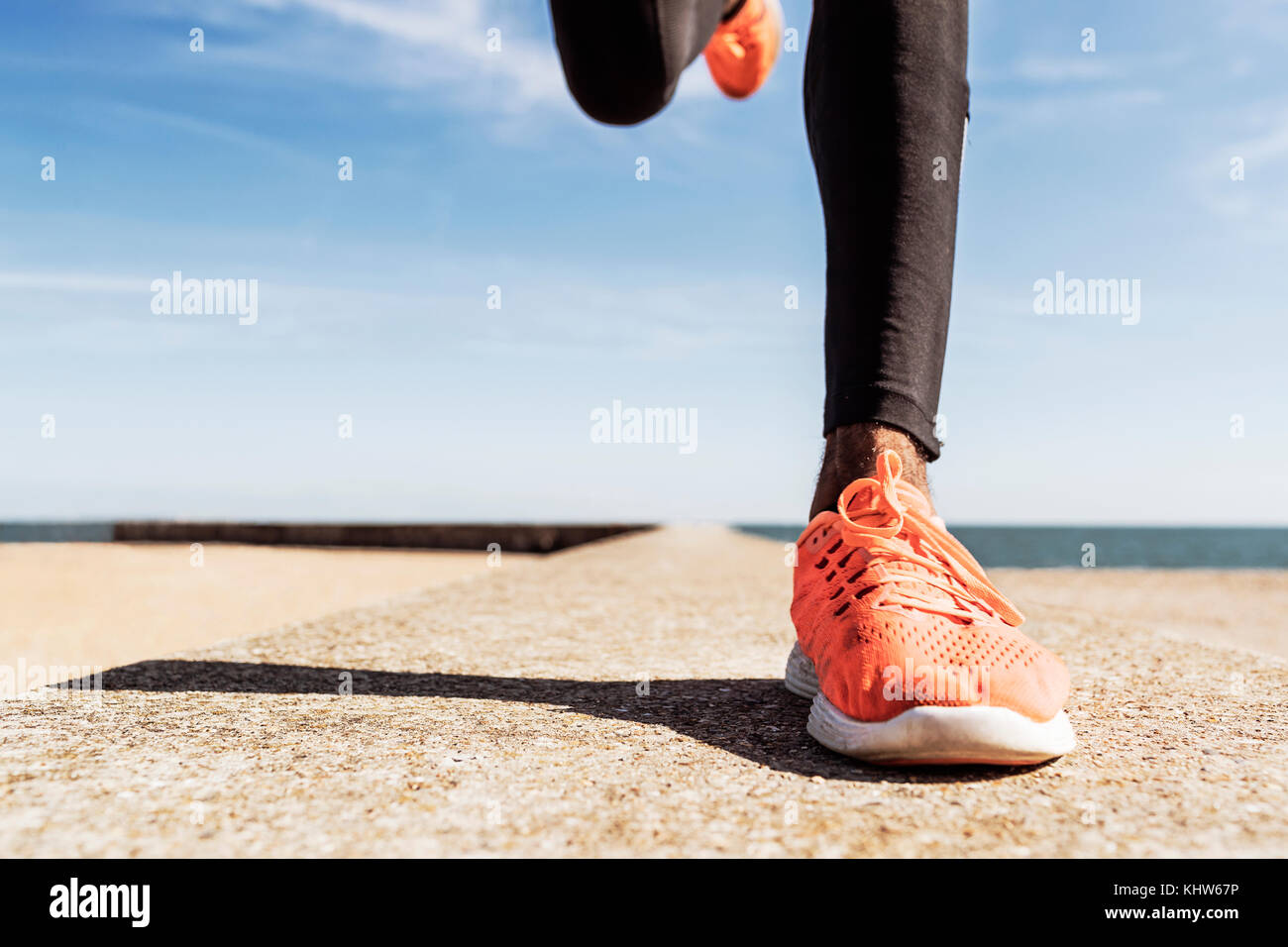 Man running away low hi-res stock photography and images - Alamy