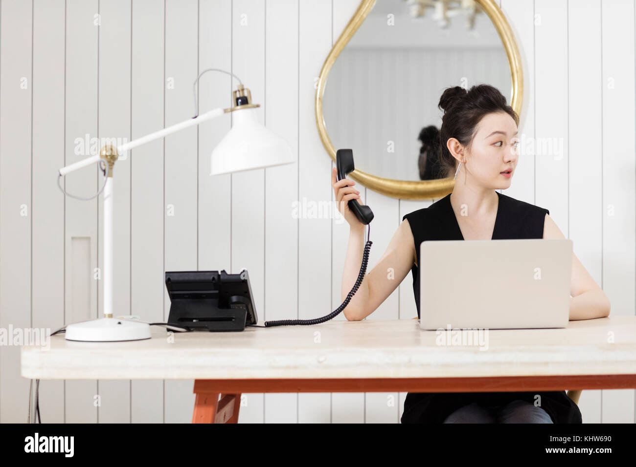 Receptionist at work Stock Photo - Alamy