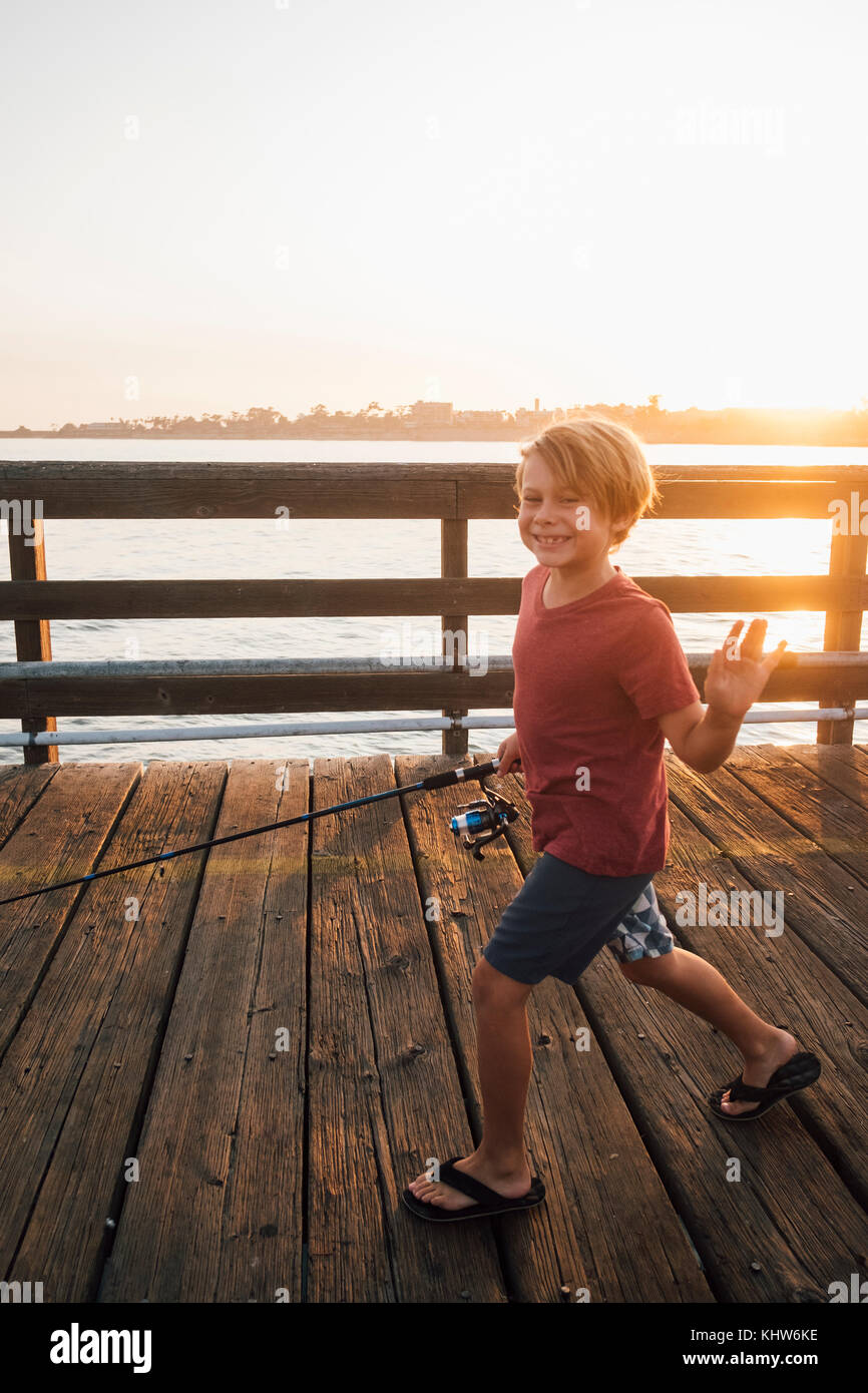 Full Length Waving Smiling High Resolution Stock Photography and Images ...