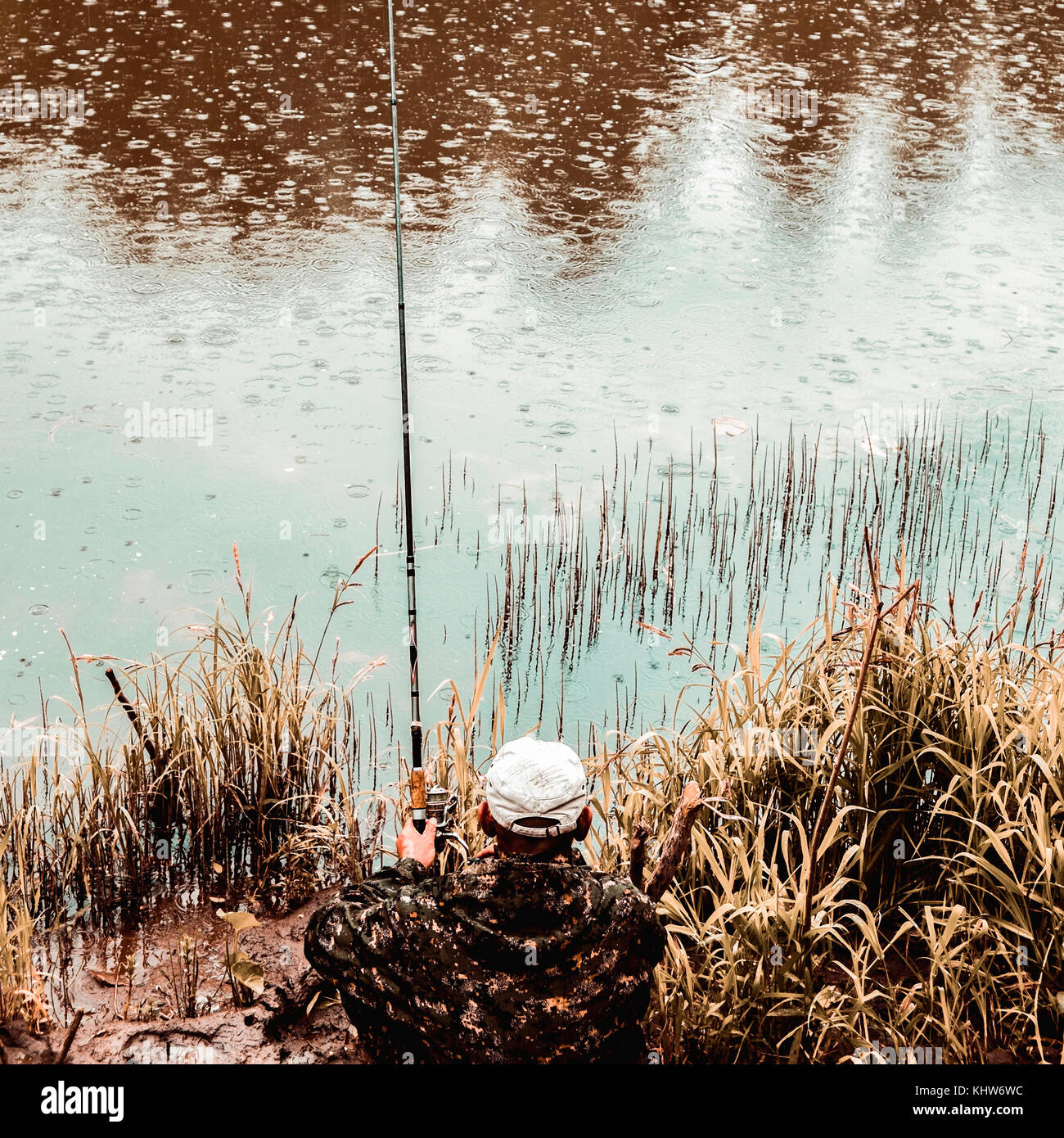 Man fishing in lake, Ural, Sverdlovsk, Russia Stock Photo - Alamy