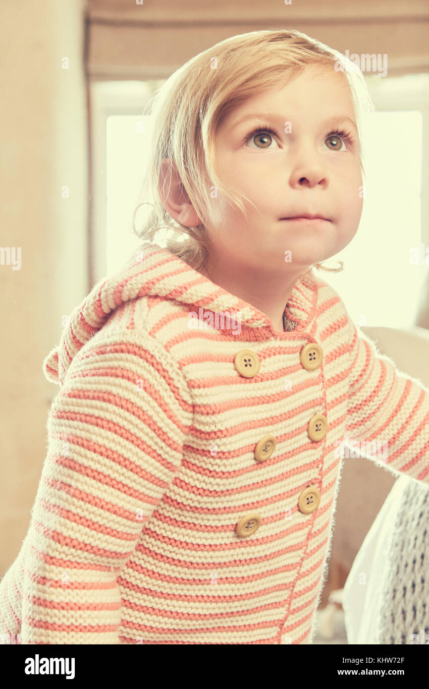 Female toddler gazing upward Stock Photo - Alamy