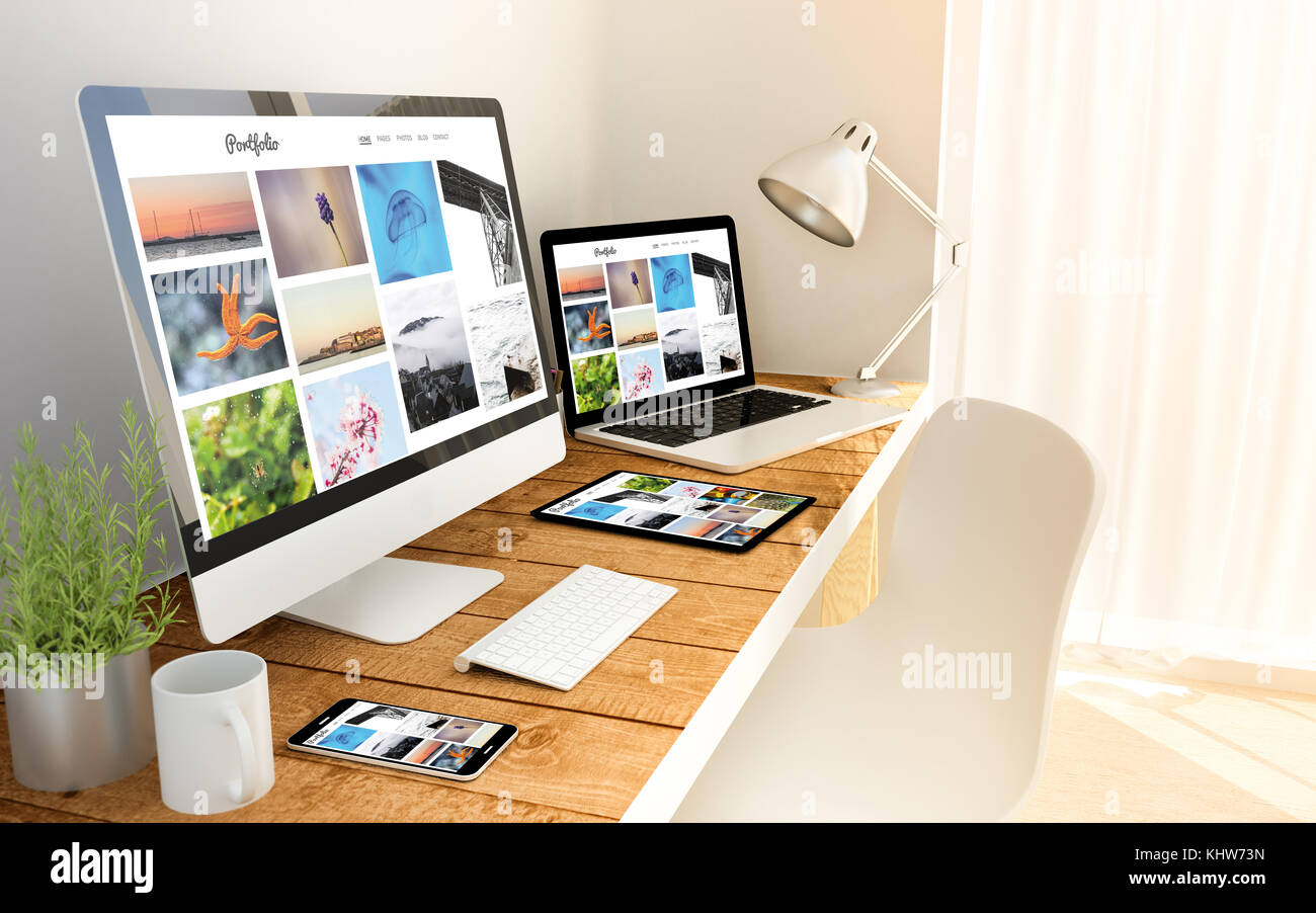 Digital generated devices over a wooden table with photo portfolio ...